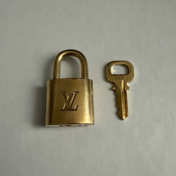 Louis Vuitton | Accessories | Louis Vuitton Gold Lock And Key 30 | Poshmark